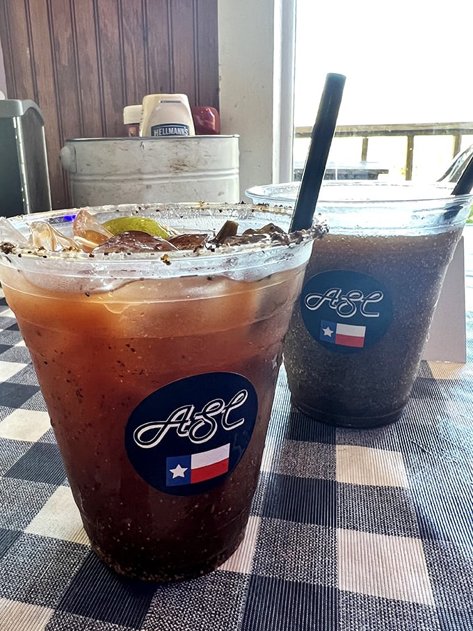 Even the drinks at Alamo Springs come with Texas pride. Those custom cups aren't just holding beverages—they're holding liquid refreshment with a side of state loyalty. 