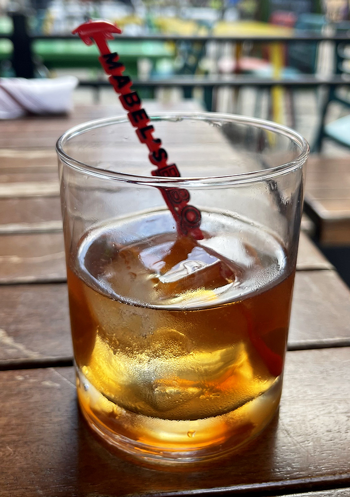 That whiskey isn't just sitting there looking pretty—it's contemplating its smoky future alongside equally smoky meats.