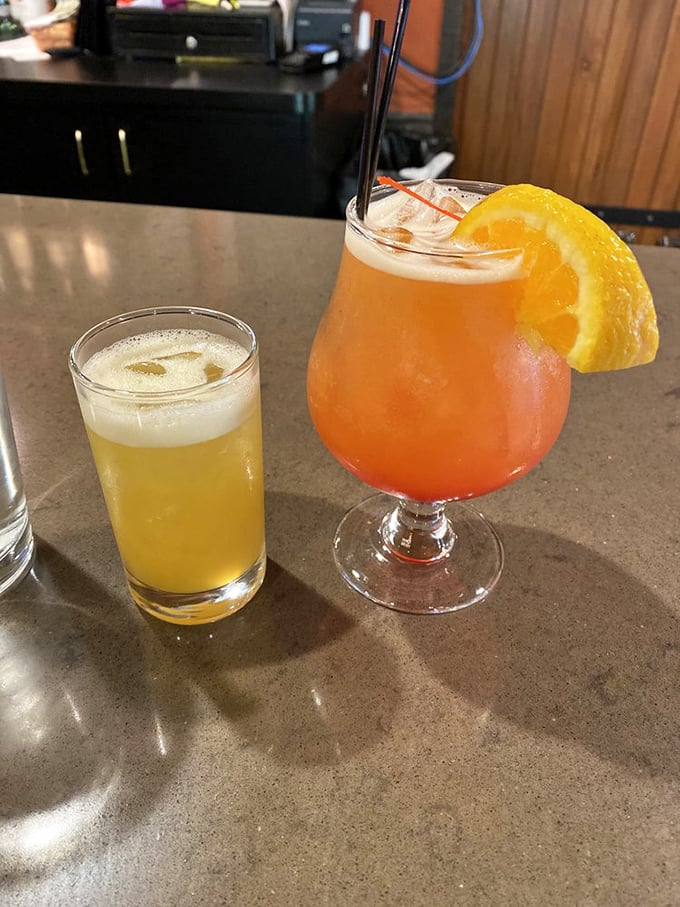 The "brews" part of the equation – a refreshing beer and a sunset-colored cocktail that promise to cut through all that delicious barbecue richness.