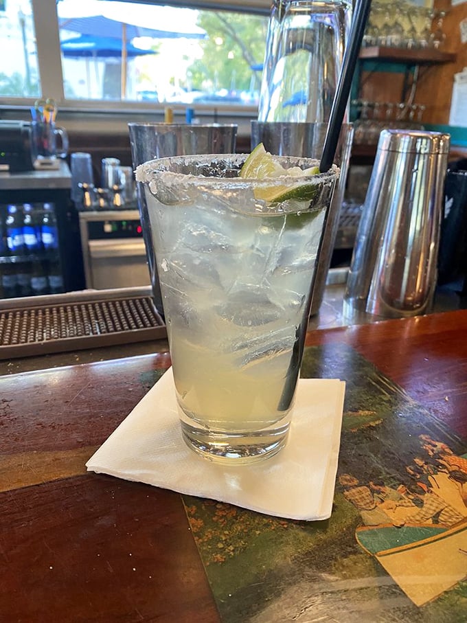 A salt-rimmed glass of citrusy refreshment. This isn't just a margarita—it's the perfect liquid companion to a feast from the Gulf.