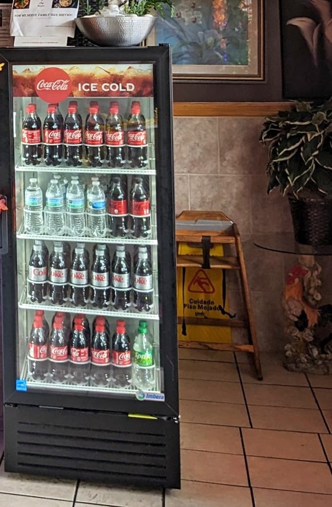 The humble beverage cooler stands ready with cold drinks – the perfect foil to tame the heat of authentic curries that don't pull their punches.