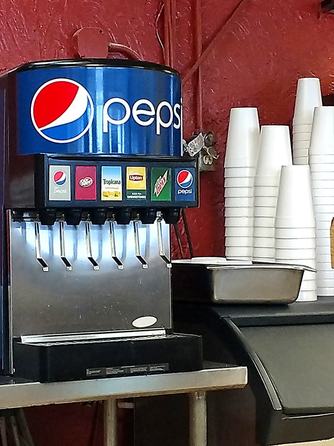 The soda fountain—where decisions about Pepsi or Mountain Dew become surprisingly important philosophical choices when paired with legendary chicken.