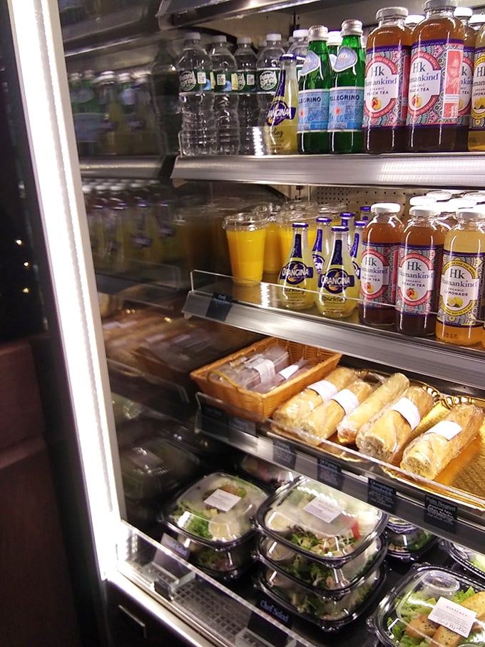 The drink cooler offers the perfect accompaniment to your sandwich adventure. Those pre-made salads aren't just healthy options—they're time-savers for the lunch rush.