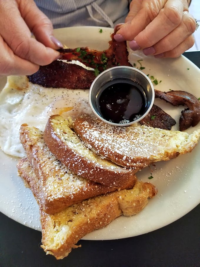French toast that makes regular bread feel inadequate. Dusted with powdered sugar and served with maple syrup for that sweet morning symphony.