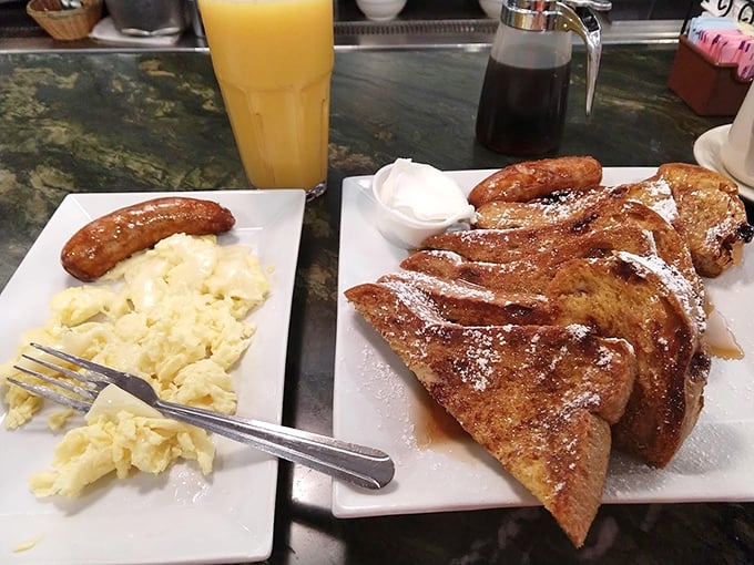 French toast that doesn't just break your fast – it shatters it with cinnamon-sugar glory and maple syrup rivers.