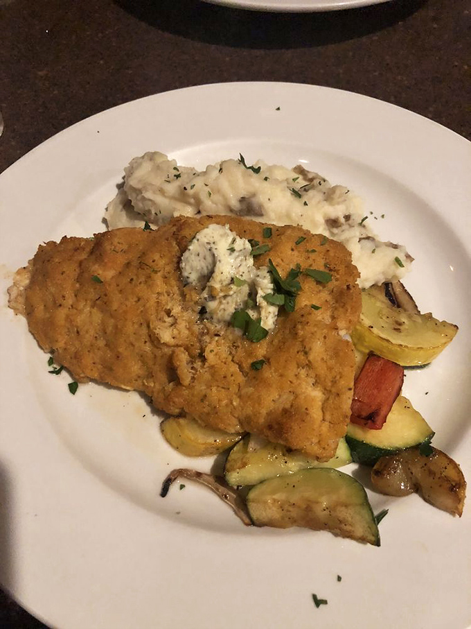 Crispy on the outside, tender within – this fried grouper doesn't just set the bar for fish, it is the bar. Those roasted vegetables aren't just sidekicks.