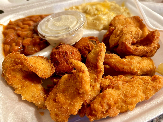 Fried fish that would make Neptune himself swim to shore – perfectly flaky inside with a crispy coating that shatters with each heavenly bite.