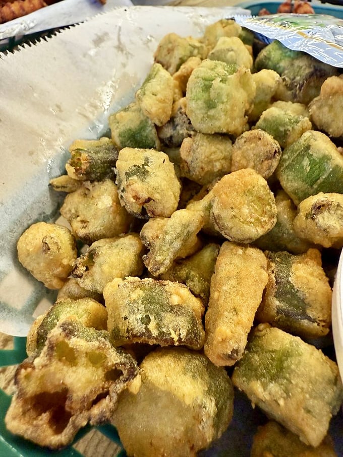 Fried okra: the vegetable for people who think they don't like vegetables. These golden nuggets convert skeptics faster than a revival preacher.