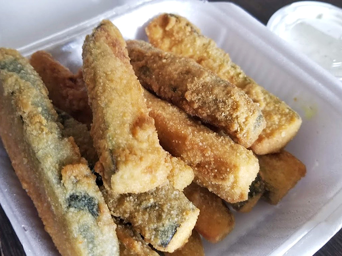 Golden-brown zucchini sticks with a crispy cornmeal coating that shatters with each bite—vegetables have never been this exciting.