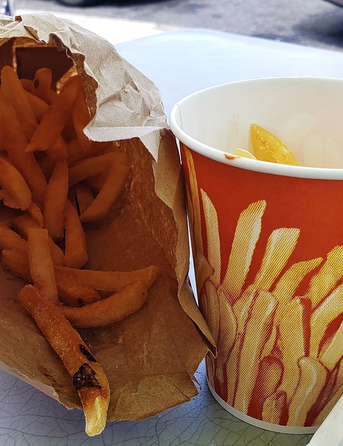These aren't just fries—they're the supporting actors that deserve their own Oscar, perfectly crisp companions to Leo's legendary sandwiches.