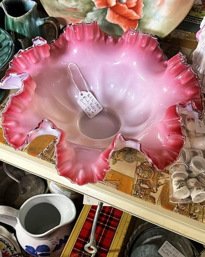 This crimson-rimmed beauty isn't just a bowl—it's a conversation piece waiting to hold everything from punch to potpourri in your home.