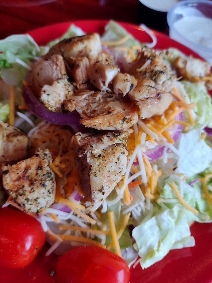 This salad isn't an apology for ordering barbecue—it's a celebration of grilled chicken that just happens to sit on some greens.