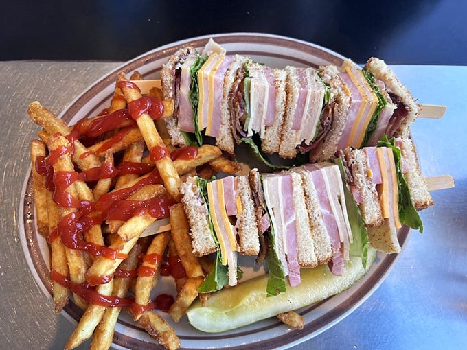 Club sandwich stacked higher than a Colorado fourteener. Those perfect layers would make a geological survey team proud.