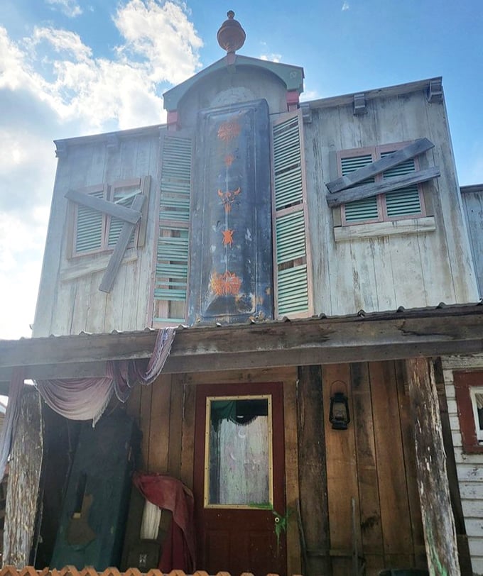 This weathered building with peeling paint and boarded windows isn't abandoned – it's atmospheric set design with Civil War flair.