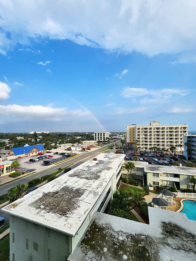 A rainbow arches over Ormond Beach like nature's seal of approval—even the sky celebrates this perfect blend of coastal charm and convenience.