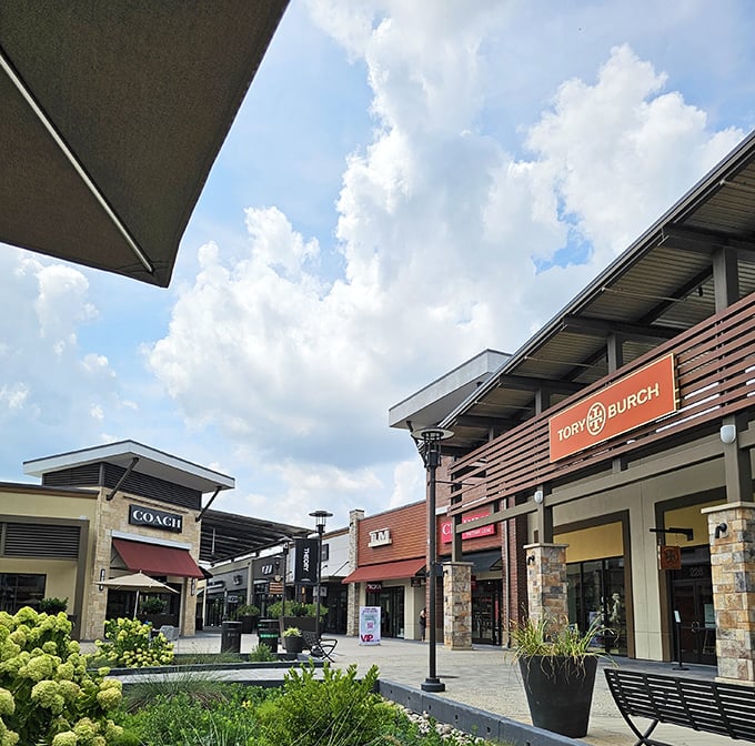High-end storefronts bathed in Maryland sunshine, where Coach meets Tory Burch in a neighborhood your wallet can actually visit.