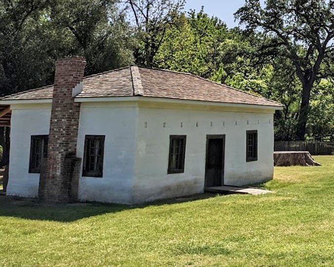 The adobe's pristine white walls and simple design speak volumes about frontier practicality—the original tiny house movement.