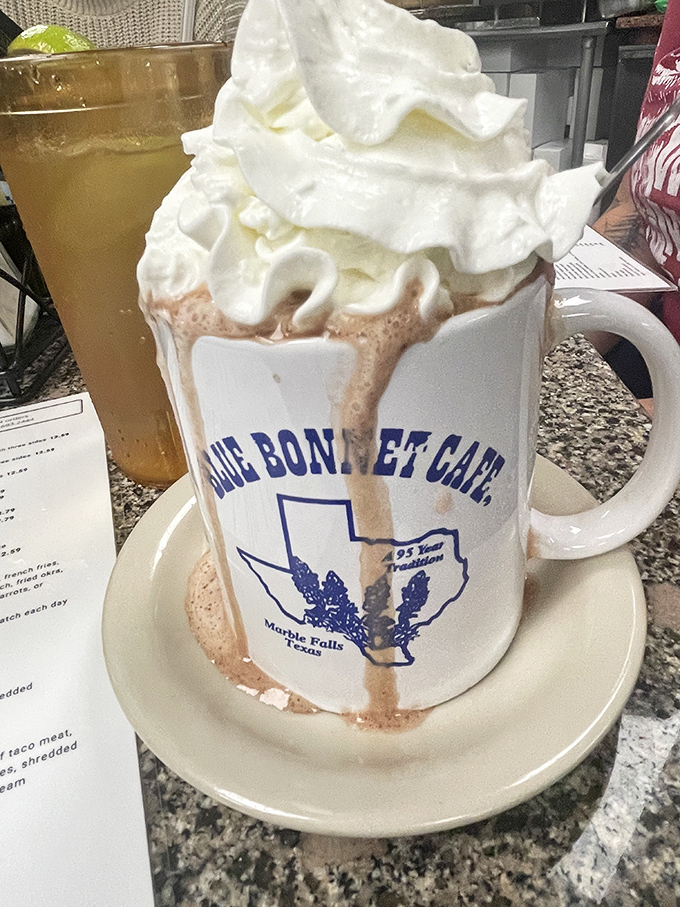 Hot chocolate that's dressed for a special occasion. That whipped cream crown would make any royal family jealous.