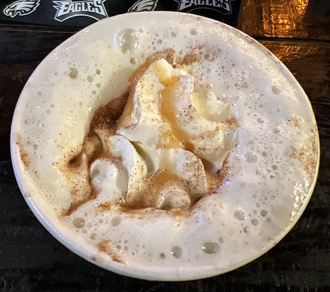 Dessert appears as a cloud of whipped cream floating on a sea of warmth – the perfect sweet finale to a savory feast.