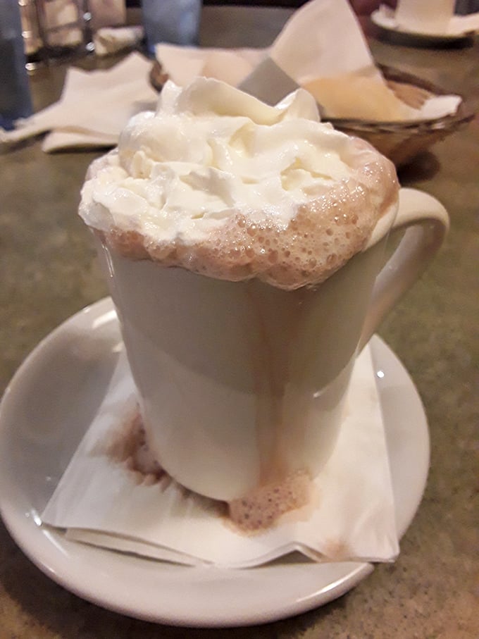 Hot cocoa elevated to an art form, crowned with a cloud of whipped cream. Winter blues don't stand a chance against this cup.