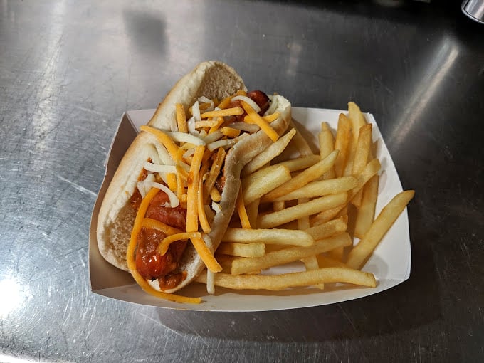 Hot dogs dressed for success. In the hierarchy of handheld delights, these belong in the upper echelon.