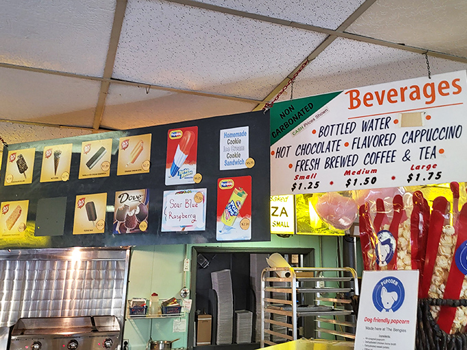 The ice cream menu board—a monument to simple pleasures that taste infinitely better when consumed during coming attractions.