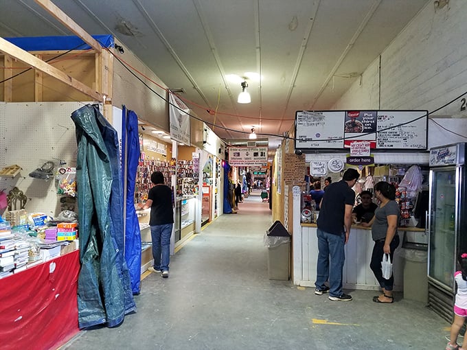The indoor market corridor—where shopping becomes an adventure and every stall doorway promises a new world of possibilities.