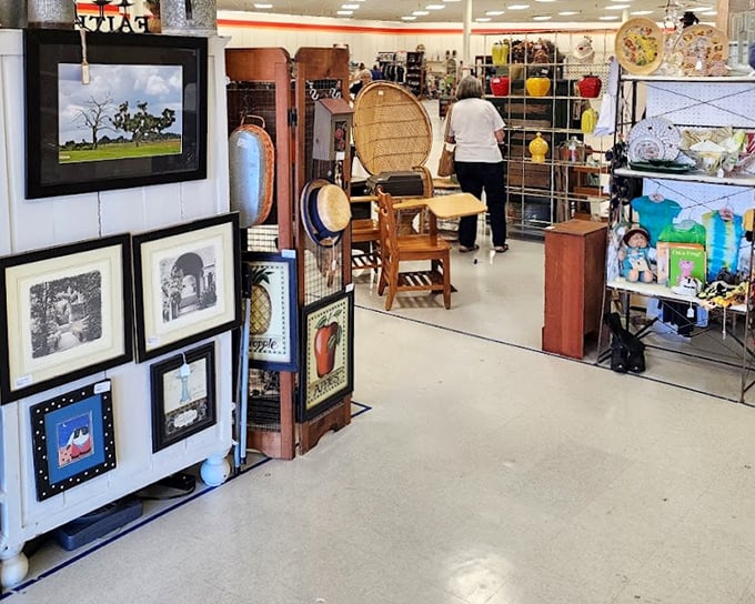 Framed artwork and wicker chairs create the perfect browsing path – like a museum where everything's actually for sale.