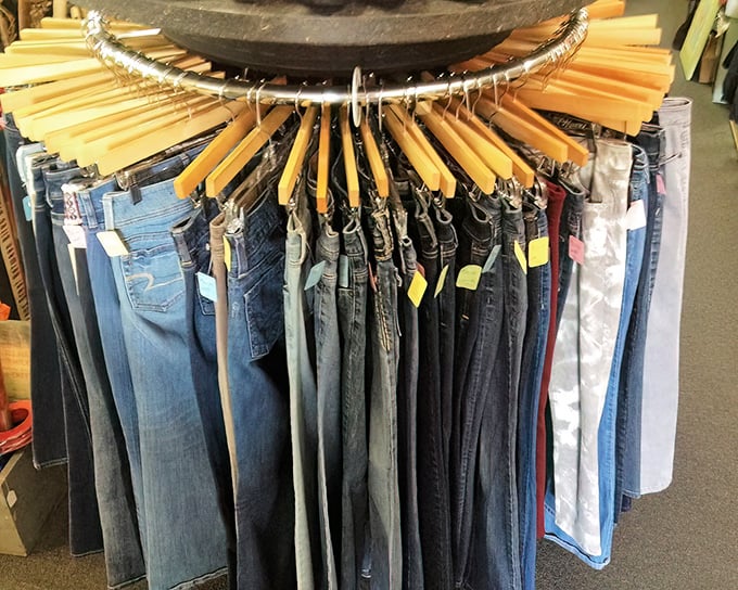 Denim dreams hang in circular formation – each pair of jeans representing someone's "maybe someday I'll fit into these again" hopes.