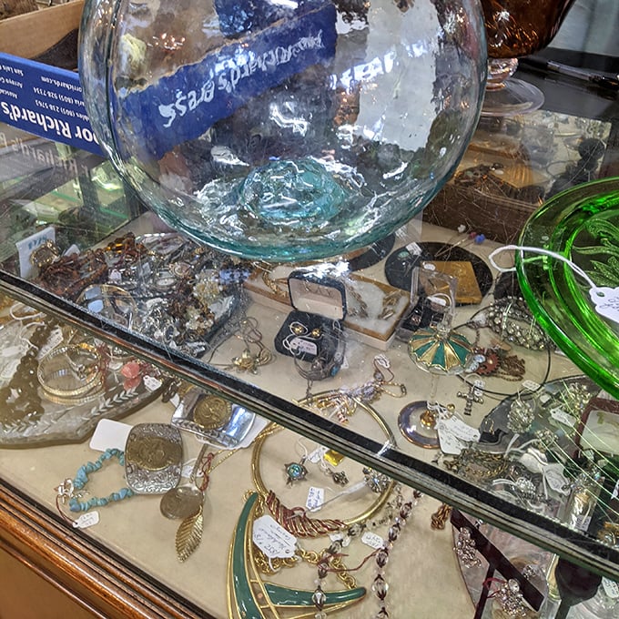 Beneath glass, yesterday's adornments await tomorrow's admirers—each brooch and pendant carrying stories we can only imagine.
