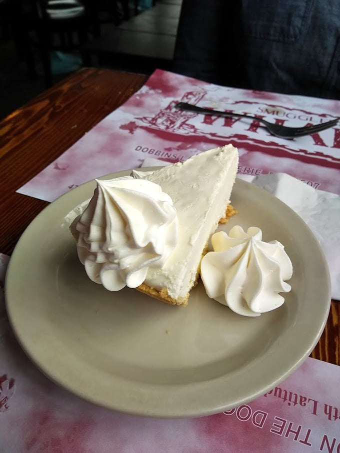 Key lime pie so tall and proud, it could run for office on a platform of pure happiness.