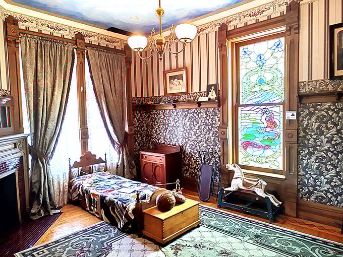 A child's room that puts modern nurseries to shame. That stained glass window would have made even the timeout corner feel magical.