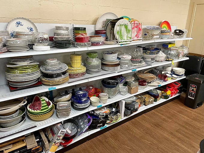 Dishes stacked with military precision—enough place settings to host everything from intimate dinners to holiday feasts for the extended family.