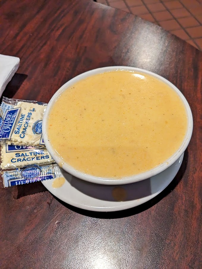 This isn't just soup—it's liquid gold. Creamy, rich, and served with no-nonsense saltines, because some traditions don't need improving.