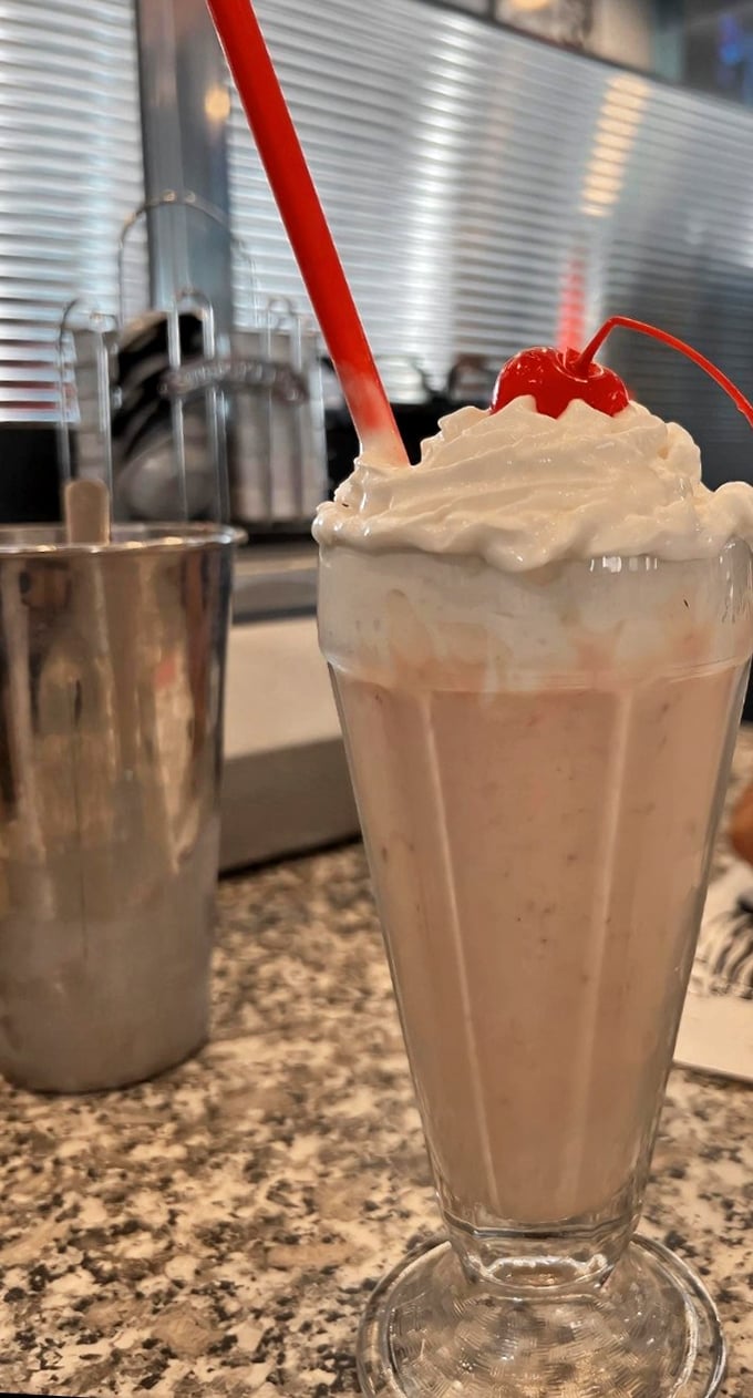 Milkshakes at Mels come with the metal mixing cup—like getting a bonus round of creamy, cold happiness after you finish the glass.