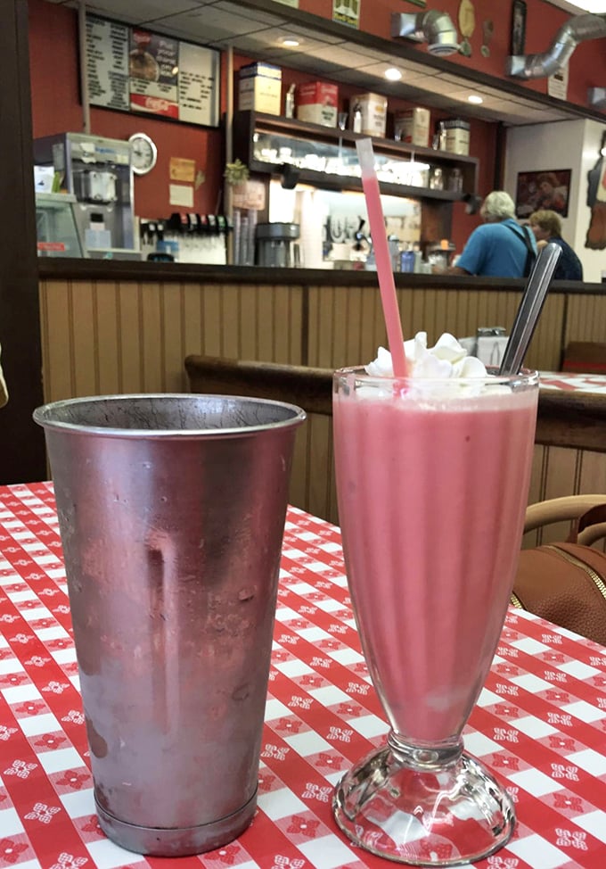 That metal mixing cup alongside your milkshake isn't just tradition—it's the restaurant equivalent of finding an extra twenty in your pocket.