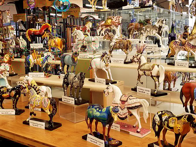 A cavalry of collectible horses stands at attention. From painted ponies to elegant equines, this display would make any collector whinny with delight.