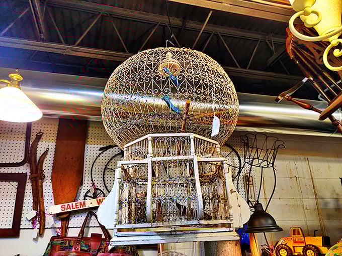 This ornate birdcage isn't just decorative—it's architectural whimsy from an era when even utilitarian objects deserved a touch of magic.