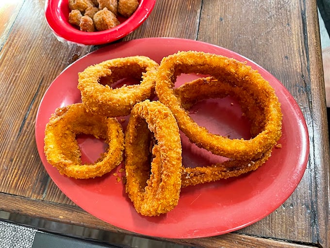 These aren't just onion rings—they're golden halos of crispy, savory delight that make you question why you'd ever eat onions any other way.