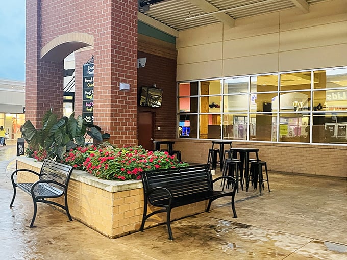 A tranquil oasis amid shopping chaos. These thoughtfully placed benches and vibrant flowers provide the perfect spot to contemplate your next purchase.