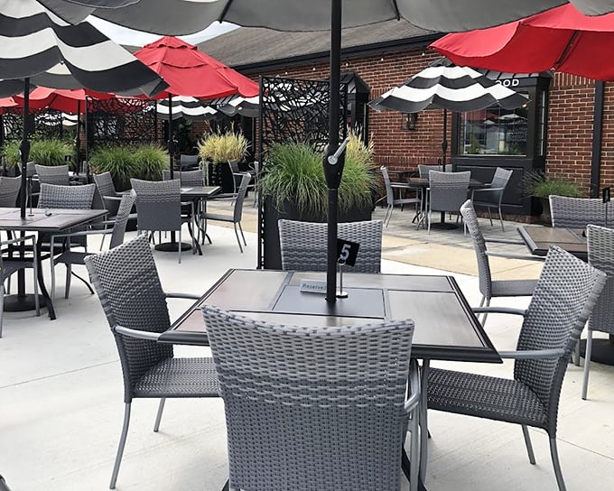 The outdoor dining area feels like your stylish friend's backyard—if your friend had impeccable taste and a chef's kitchen at their disposal.