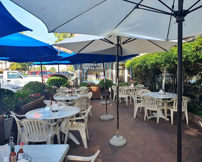 The outdoor patio – where breakfast meets sunshine in a perfect California marriage. Even the umbrellas look happy to be here.