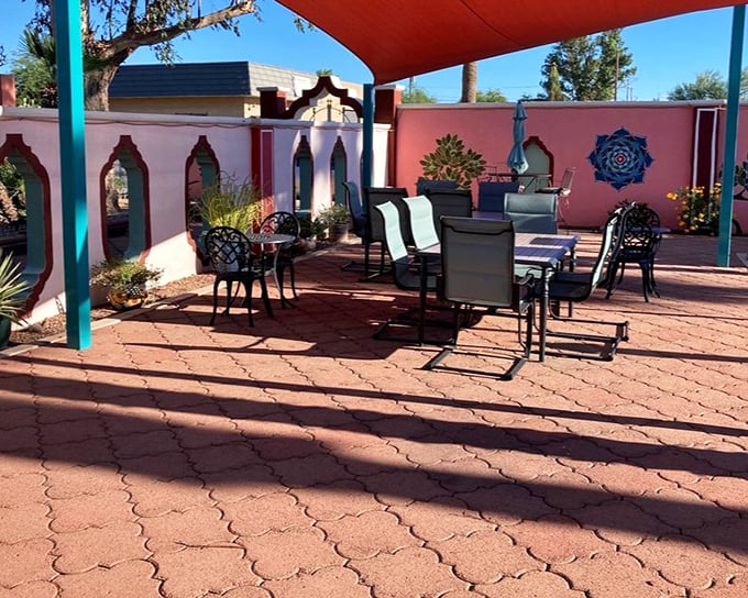 The outdoor dining area, where desert meets design, offers shade and style. Perfect for those "it's a dry heat" Arizona days when eating outside is actually pleasant.
