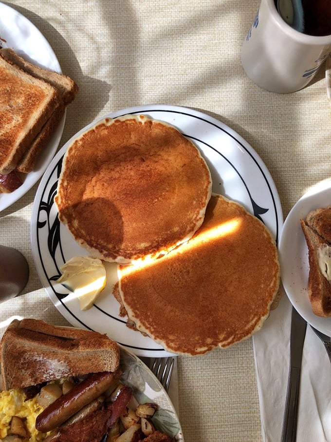 Golden pancakes that achieve that mythical balance—crisp edges, fluffy centers—the breakfast equivalent of finding a parking spot right in front of your destination.