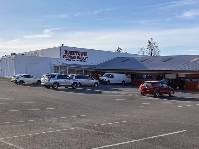 The calm before the Wednesday storm—Hometown's parking lot waits patiently for the weekly invasion of bargain hunters and food enthusiasts.