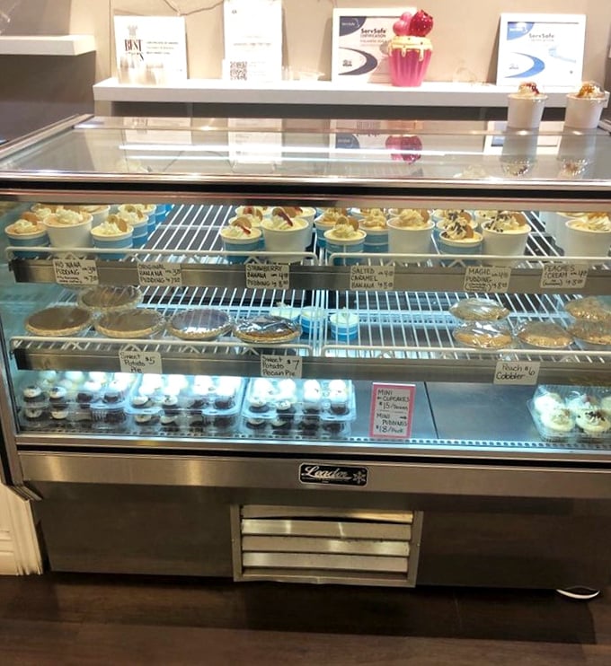 Dessert real estate at its finest. Each shelf offers a different neighborhood of sweet possibilities, no mortgage required.