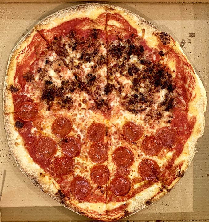 Half pepperoni, half something magical. The pizza equivalent of having your cake and eating it too—except better because it's pizza.