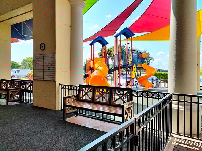 Whoever invented this colorful playground clearly understood that happy kids equal parents with more shopping stamina—retail psychology at its finest.