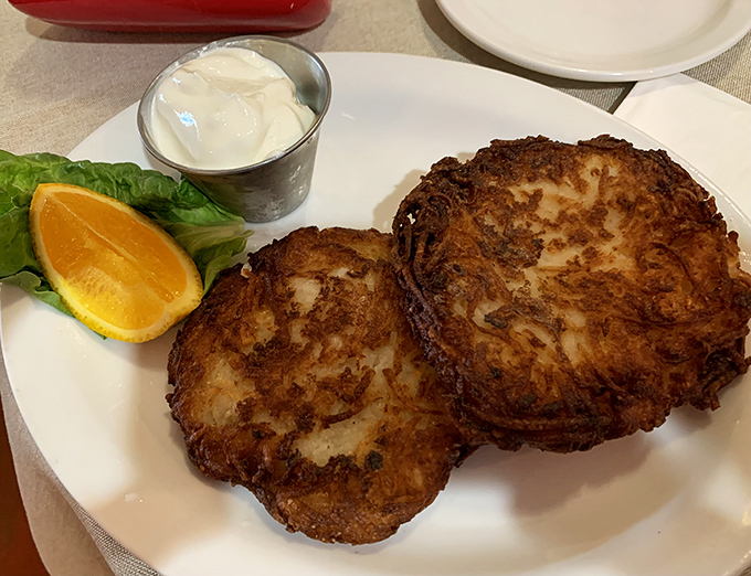 Golden potato pancakes crispy enough to make your grandmother nod approvingly from whatever cloud she's currently occupying.