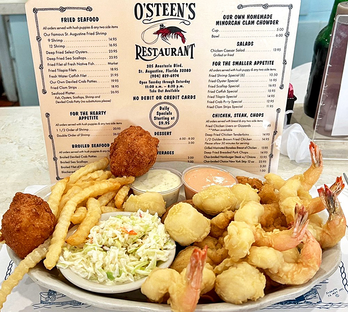 The seafood platter that launched a thousand return visits. Those golden-fried shrimp aren't just food—they're the reason people drive across state lines.